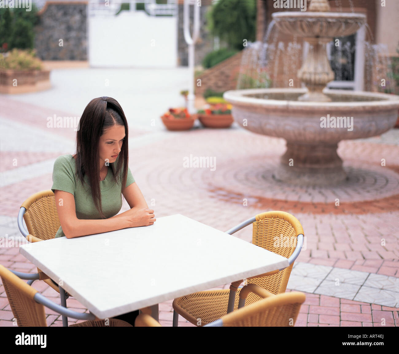 Woman waiting in a cafe Stock Photo - Alamy
