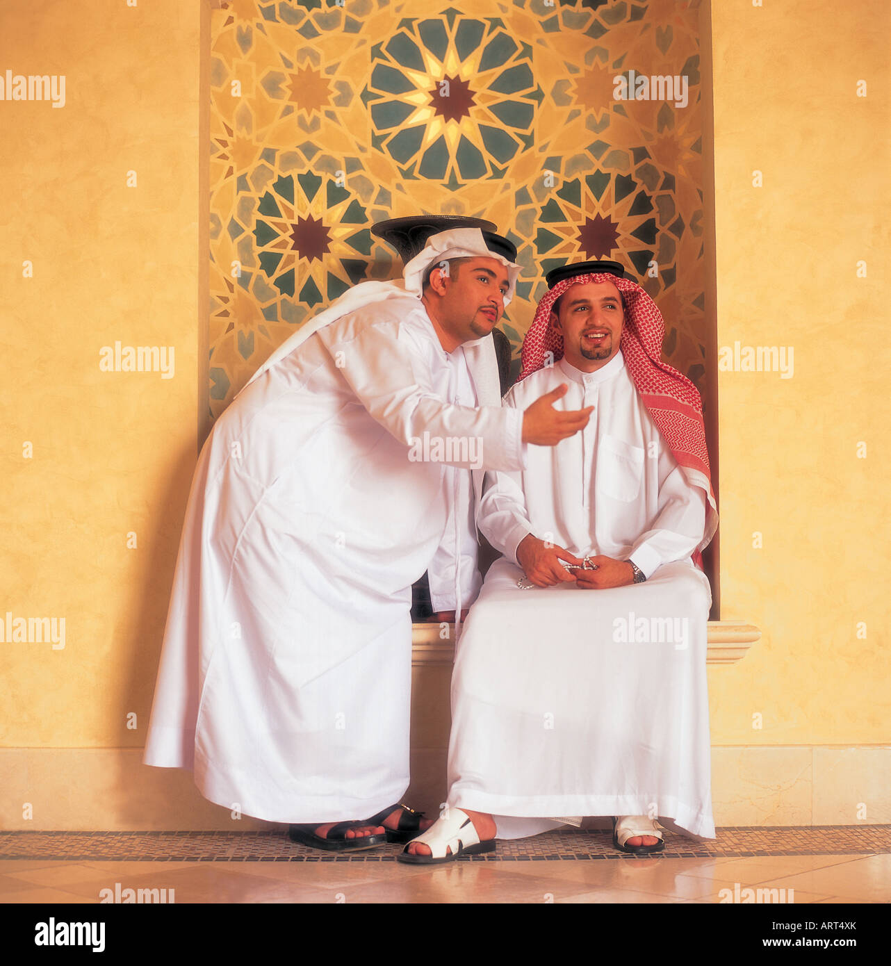 Arab men looking out Stock Photo - Alamy