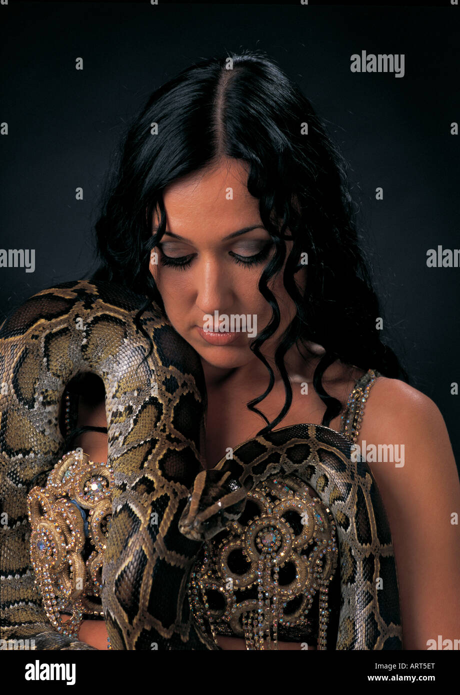 Woman with a snake hi-res stock photography and images - Alamy