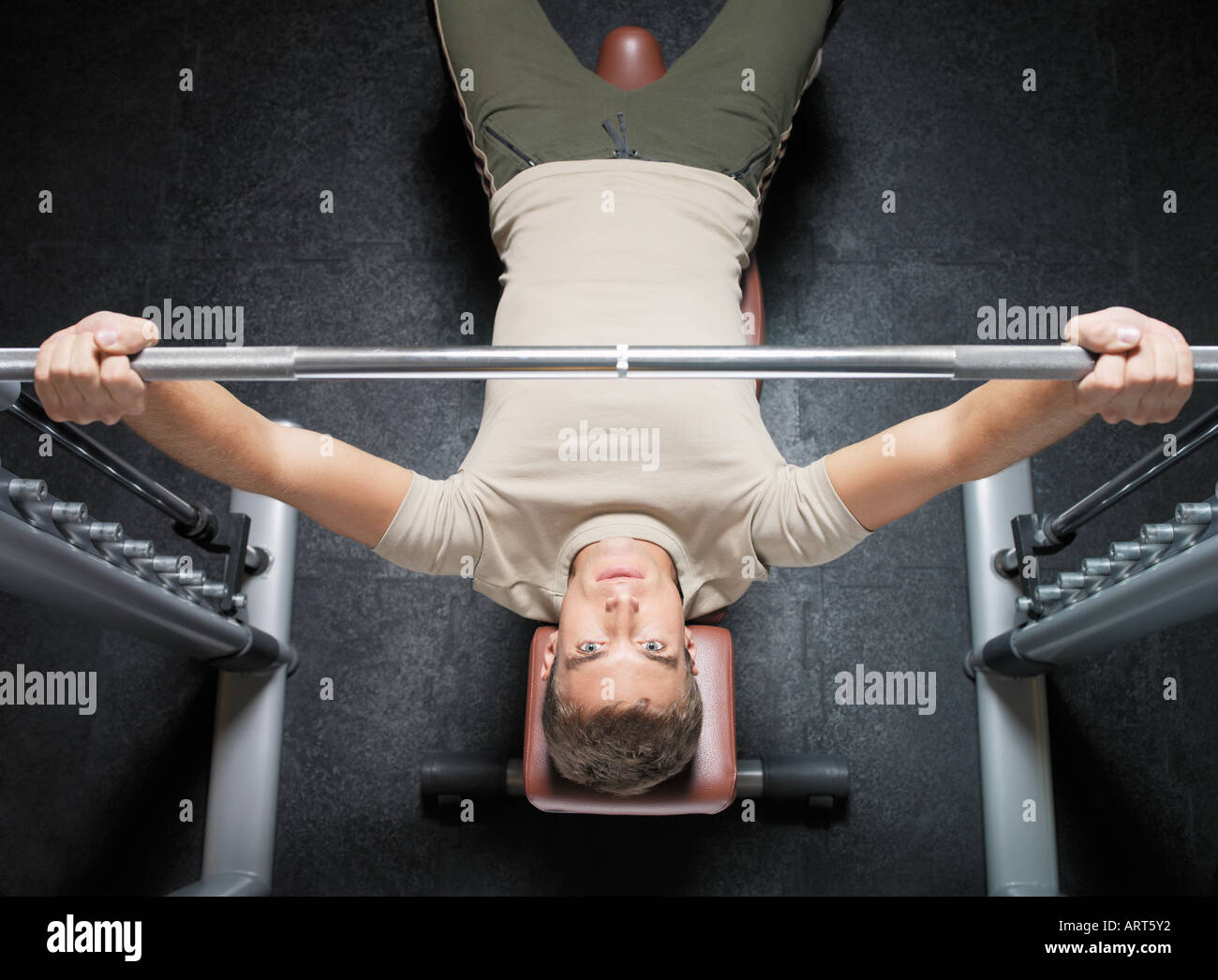 Man lifting barbell Stock Photo - Alamy