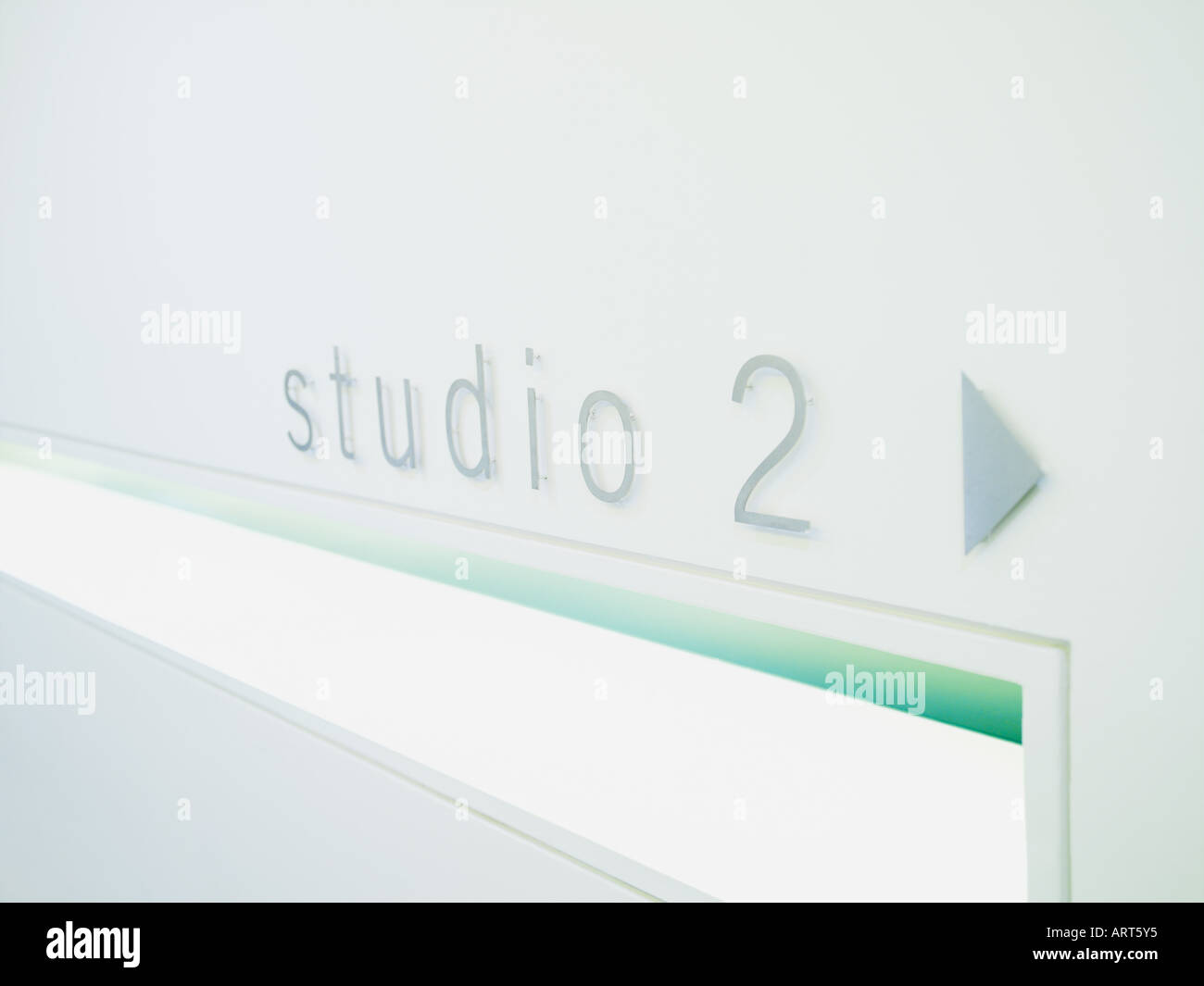 Direction sign on wall in health club Stock Photo - Alamy