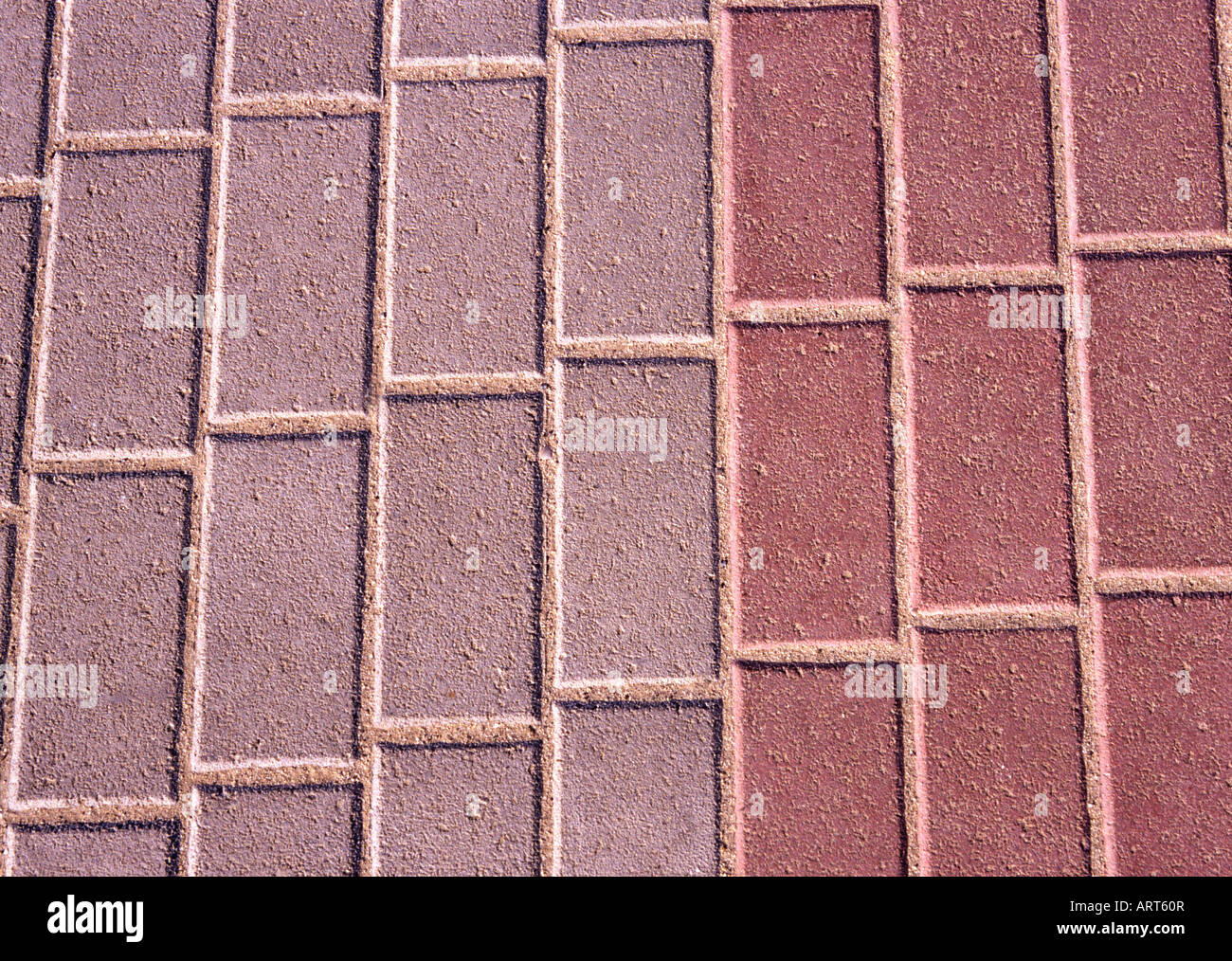 Differently colored bricks on a pavement Stock Photo - Alamy