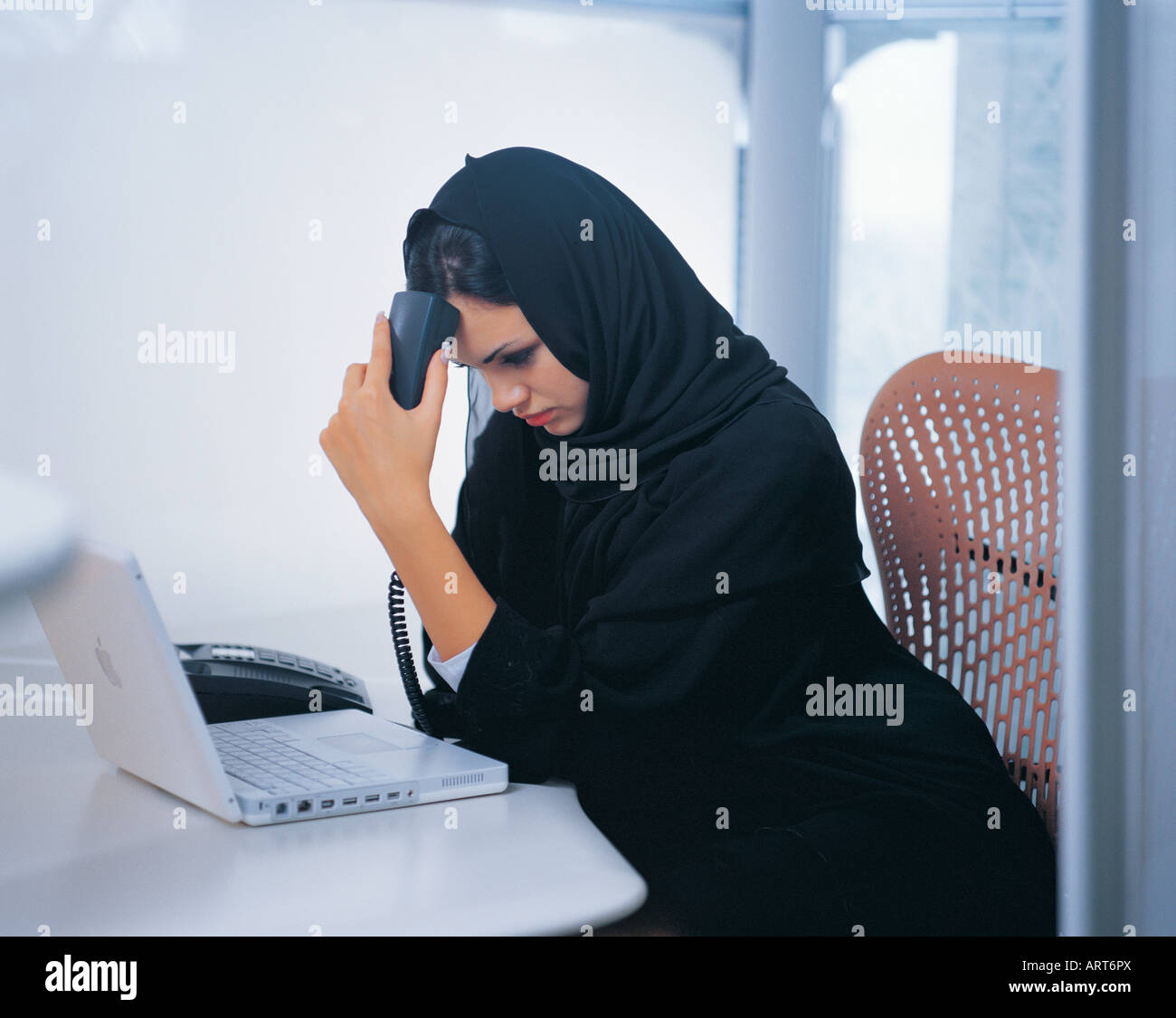 Thinking Arab businesswoman in the office Stock Photo - Alamy