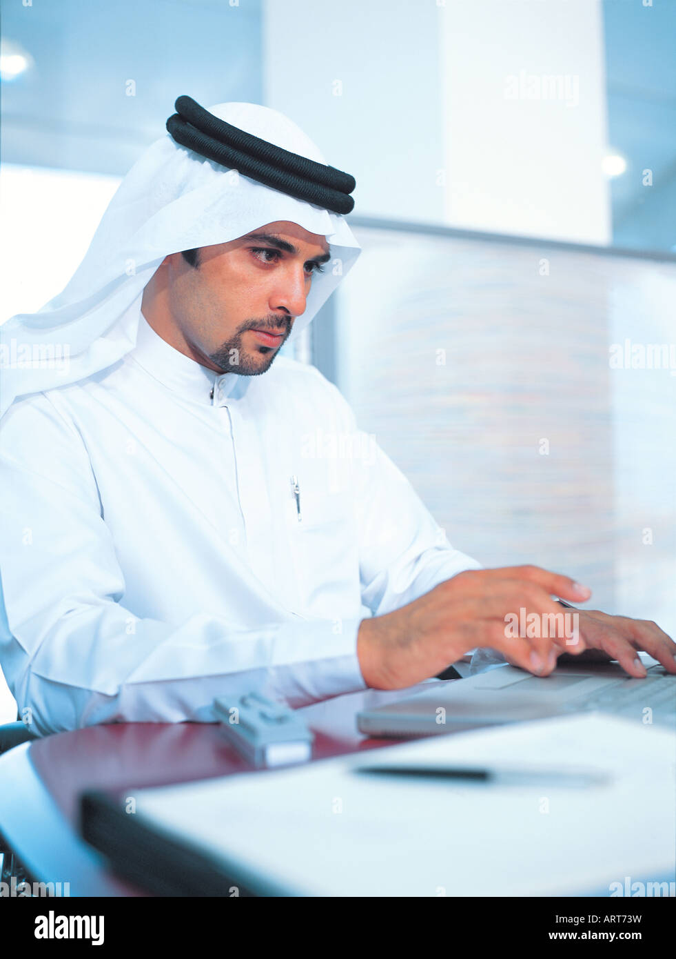 Arab businessman working on computer Stock Photo - Alamy