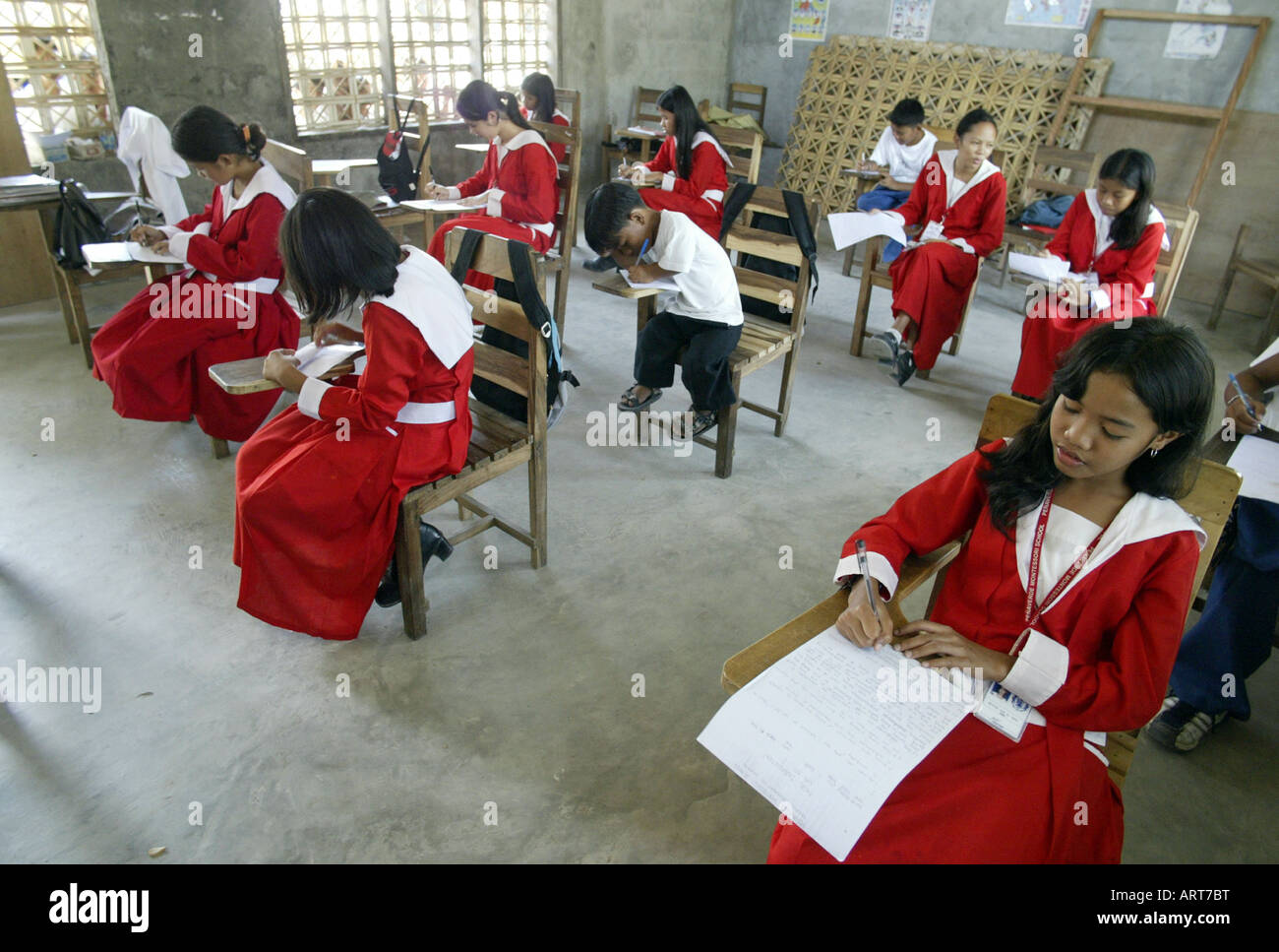 Schoolchildren take an exam in a classroom at a Montessori school in ...