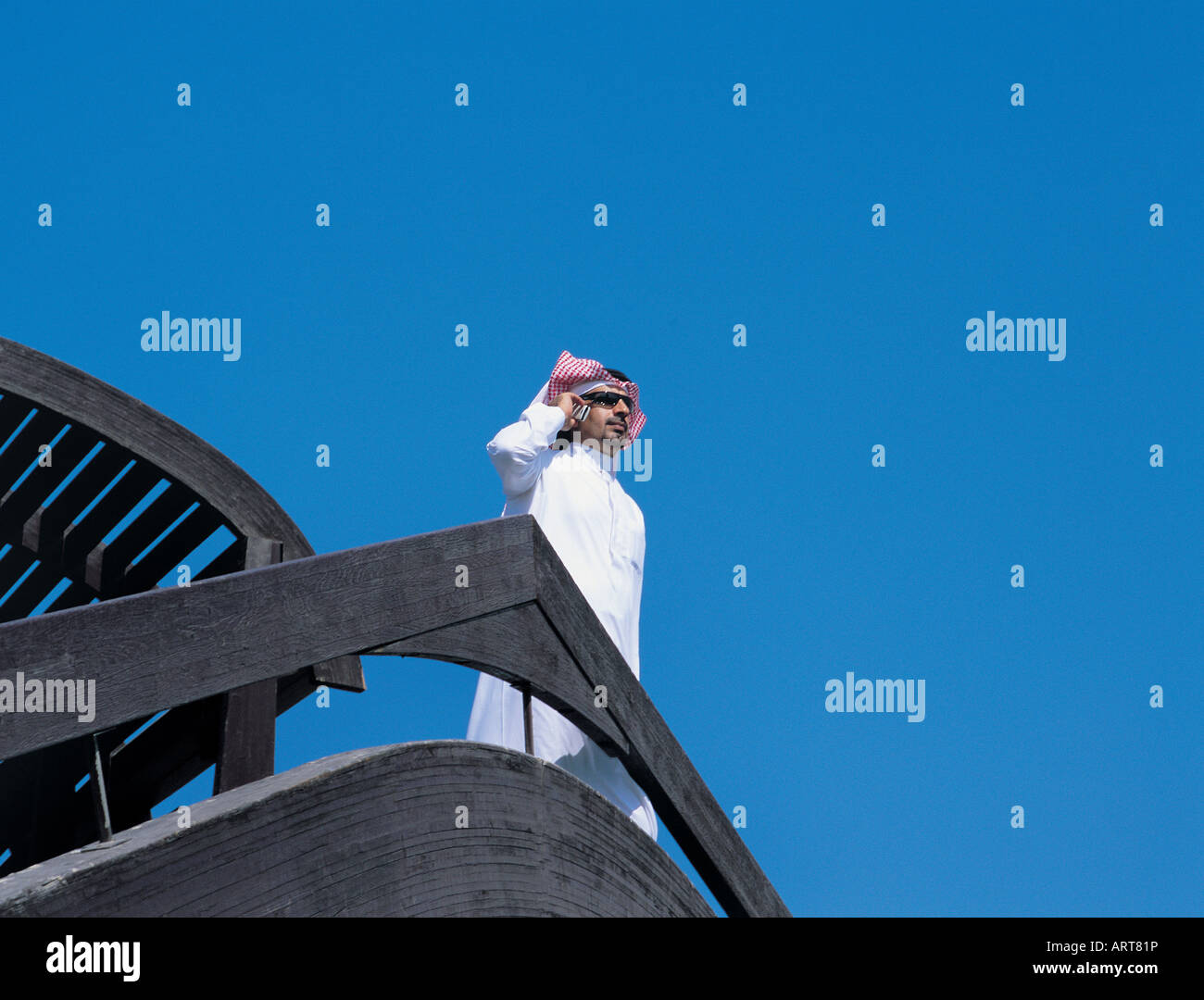 Saudi businessman using mobile phone in Jeddah, Saudi Arabia Stock ...