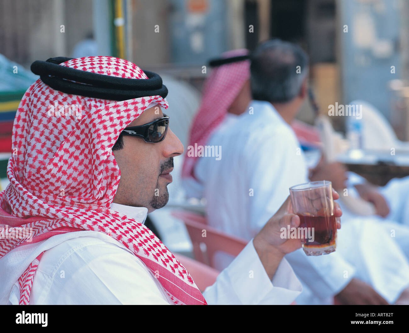 Saudi man having a cup of tea in the Old Town of Jeddah, Saudi Arabia ...