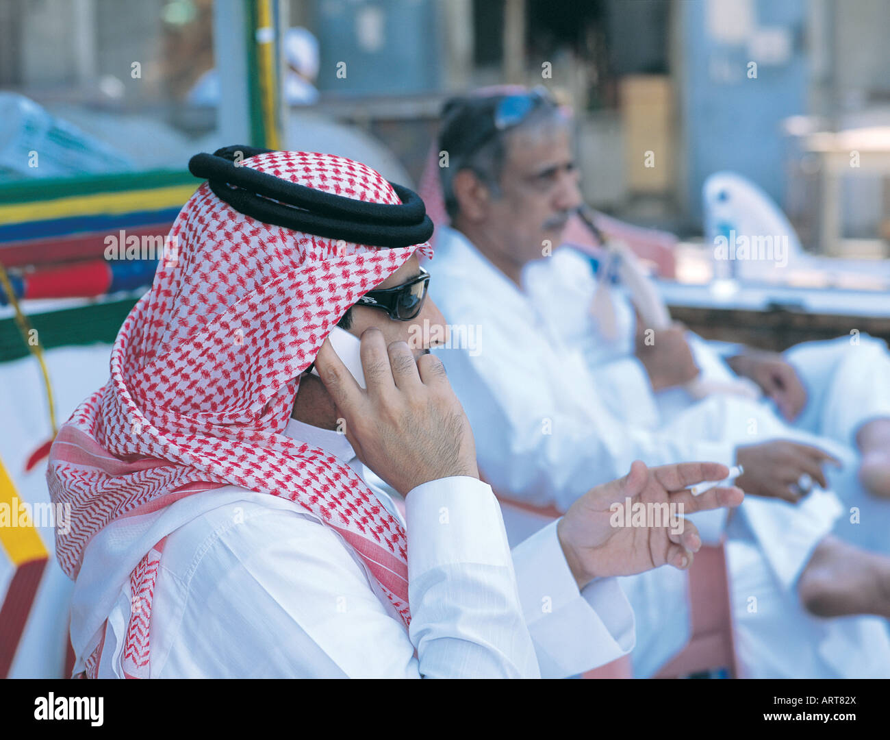 Saudi man using mobile phone in Old Town of Jeddah, Saudi Arabia Stock ...