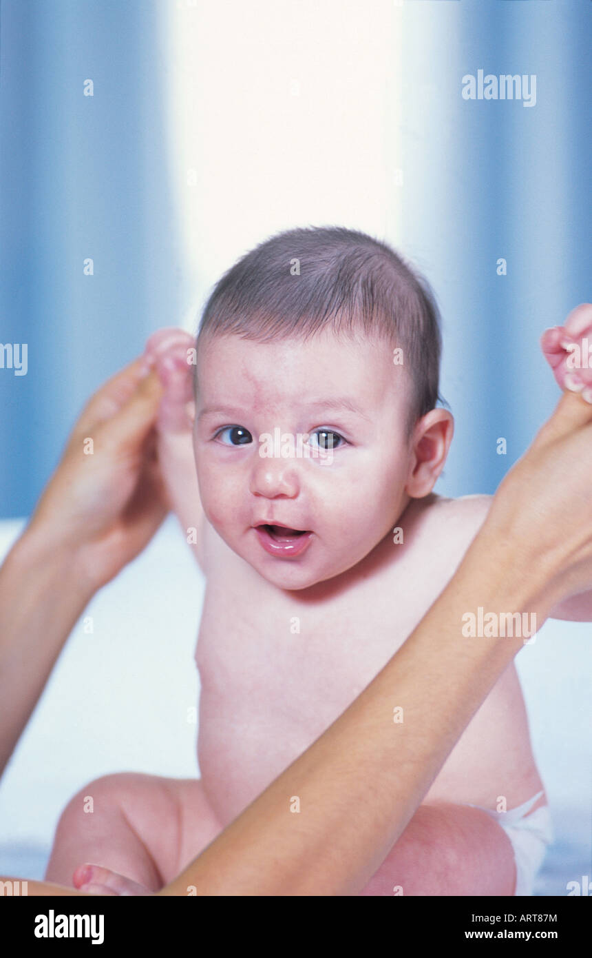 Baby sitting up Stock Photo - Alamy