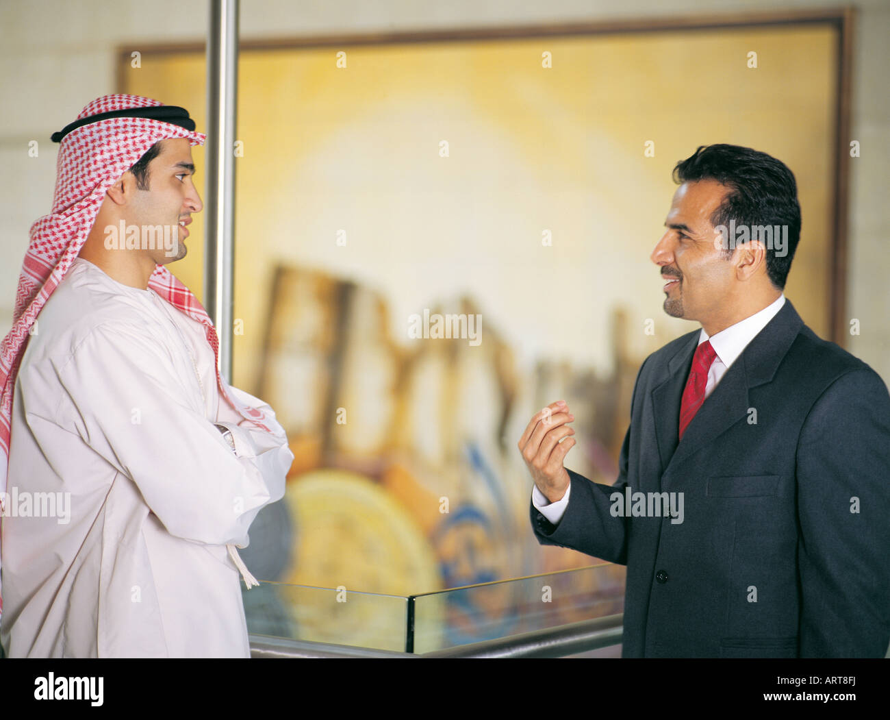 Arab businessmen having a discussion Stock Photo - Alamy