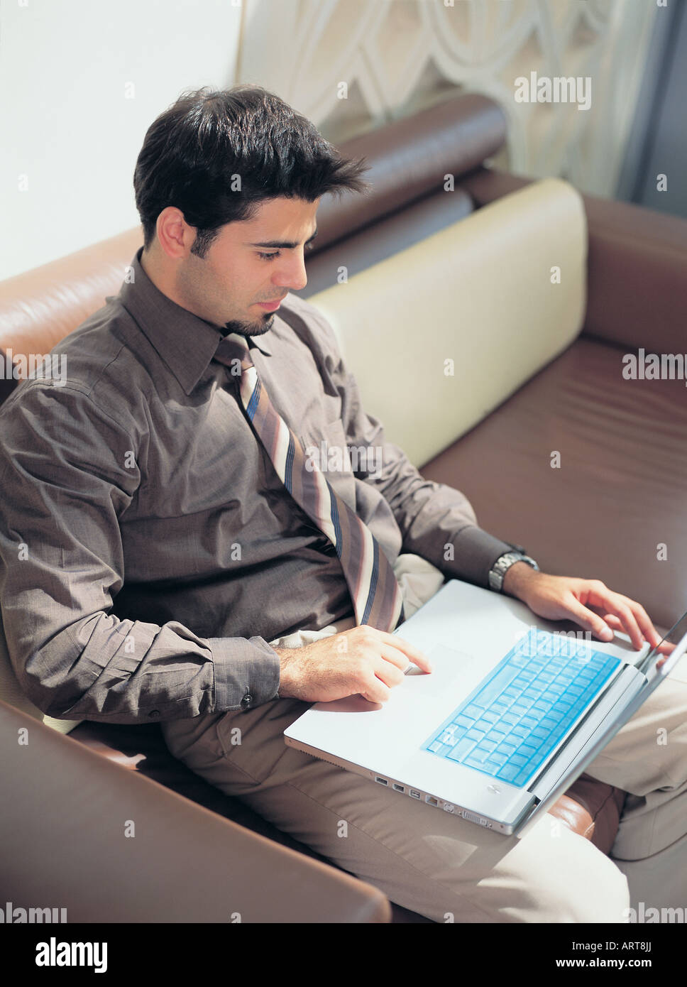 Arab businessman using laptop Stock Photo - Alamy