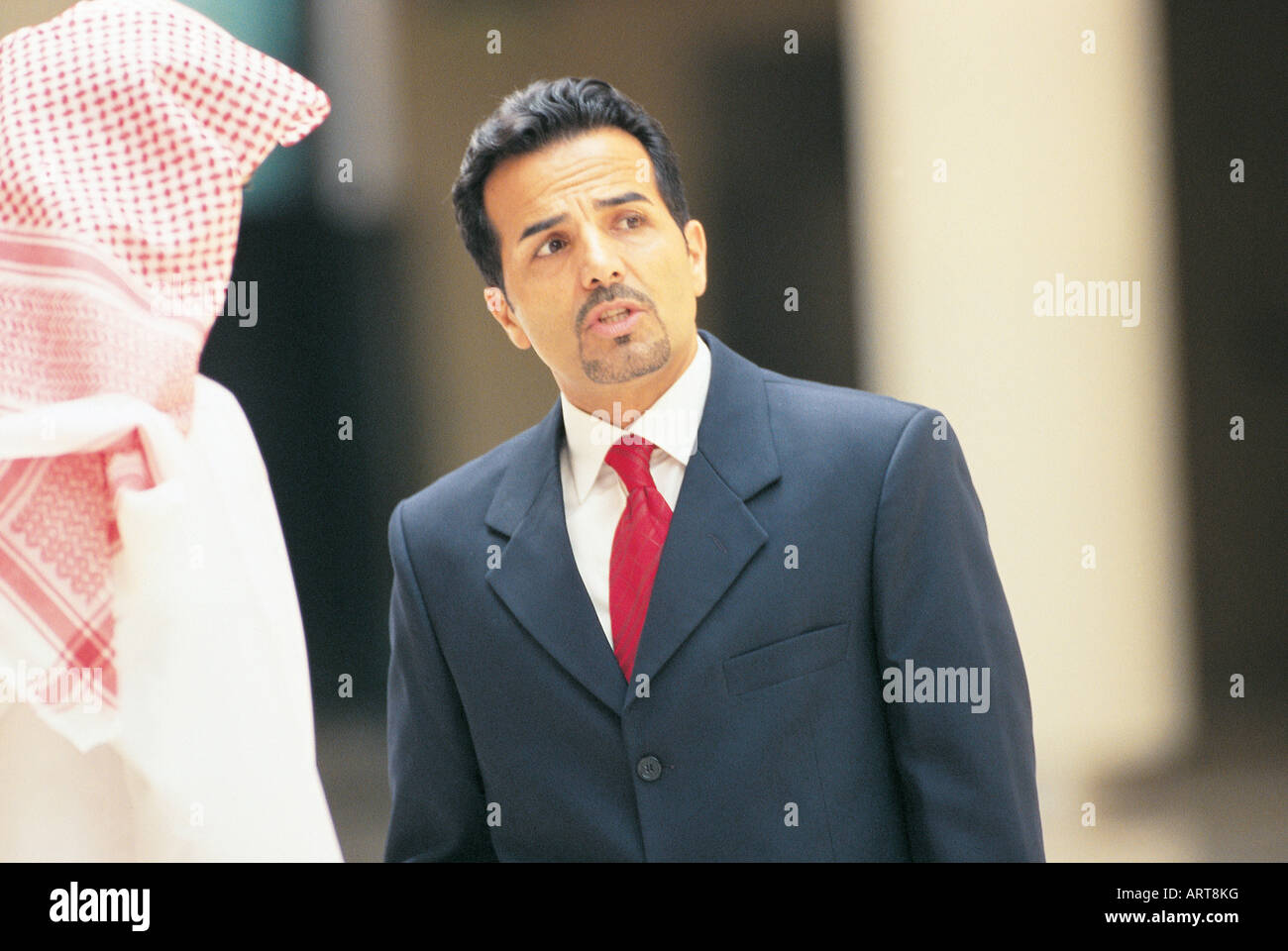 Arab businessmen having a discussion Stock Photo - Alamy