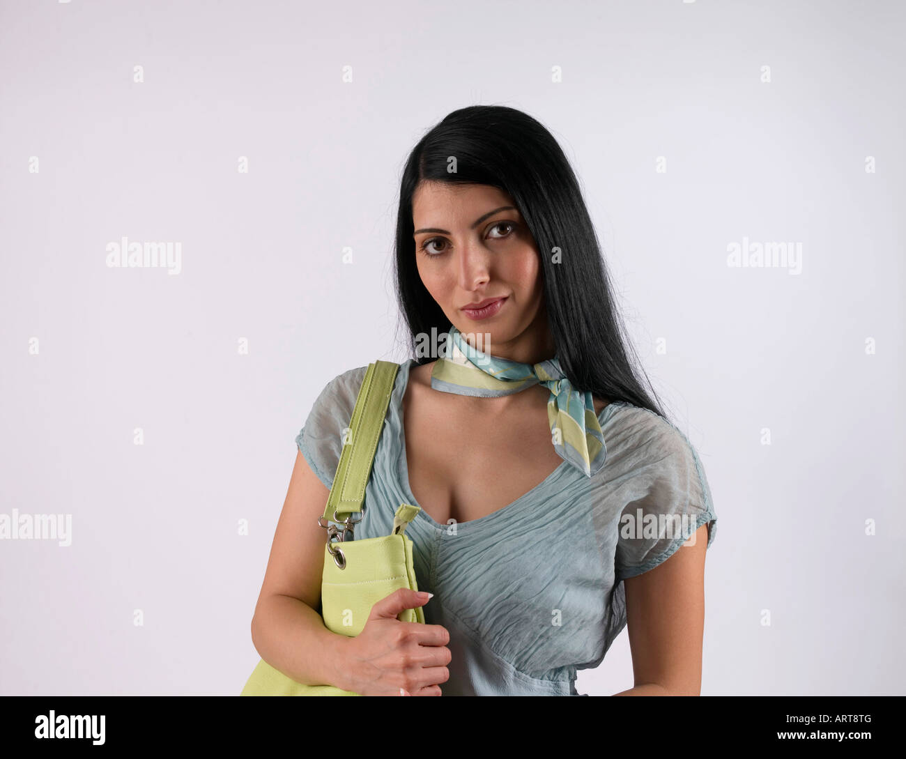 Woman carrying handbag Stock Photo - Alamy