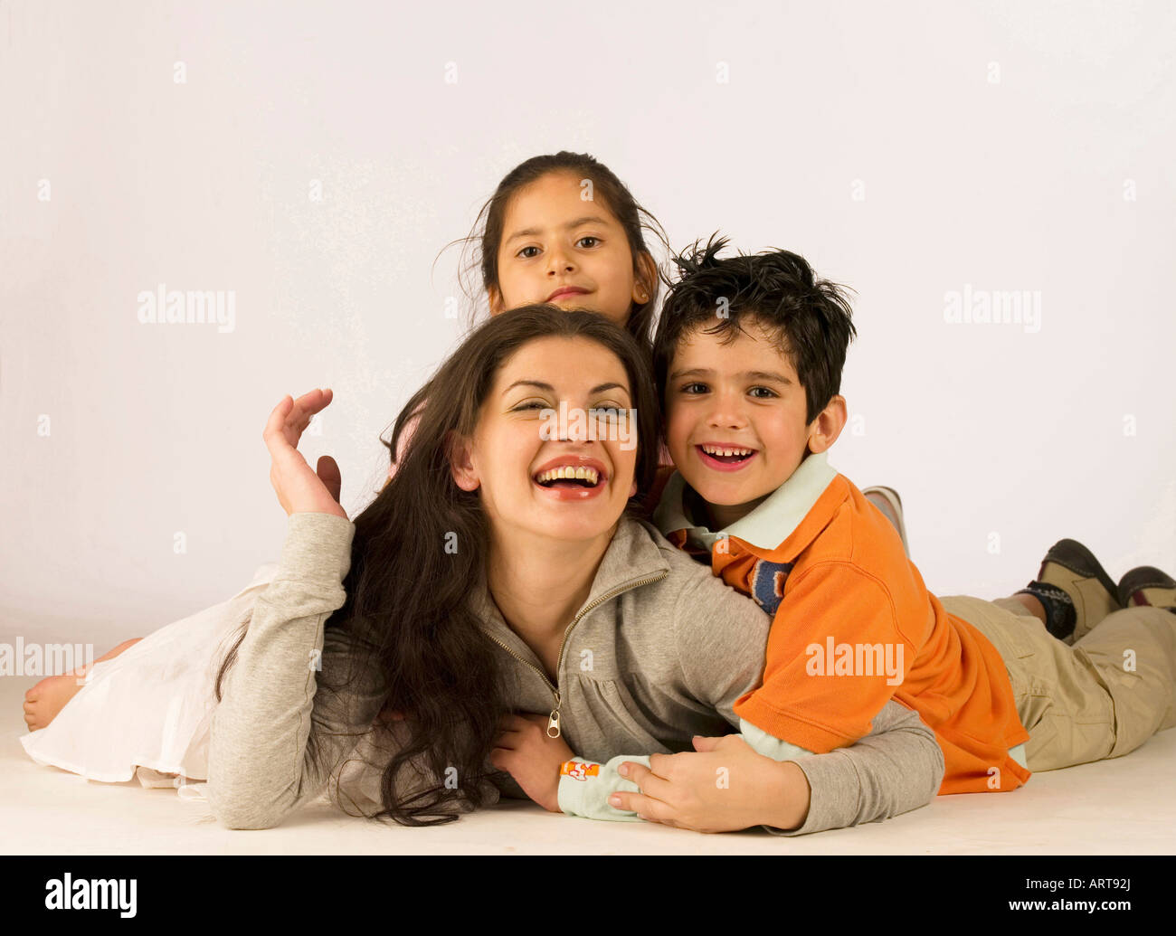 Mother and her kids having fun Stock Photo - Alamy