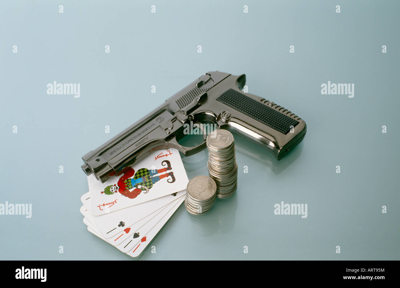 Gun, Cards and Coins Stock Photo - Alamy