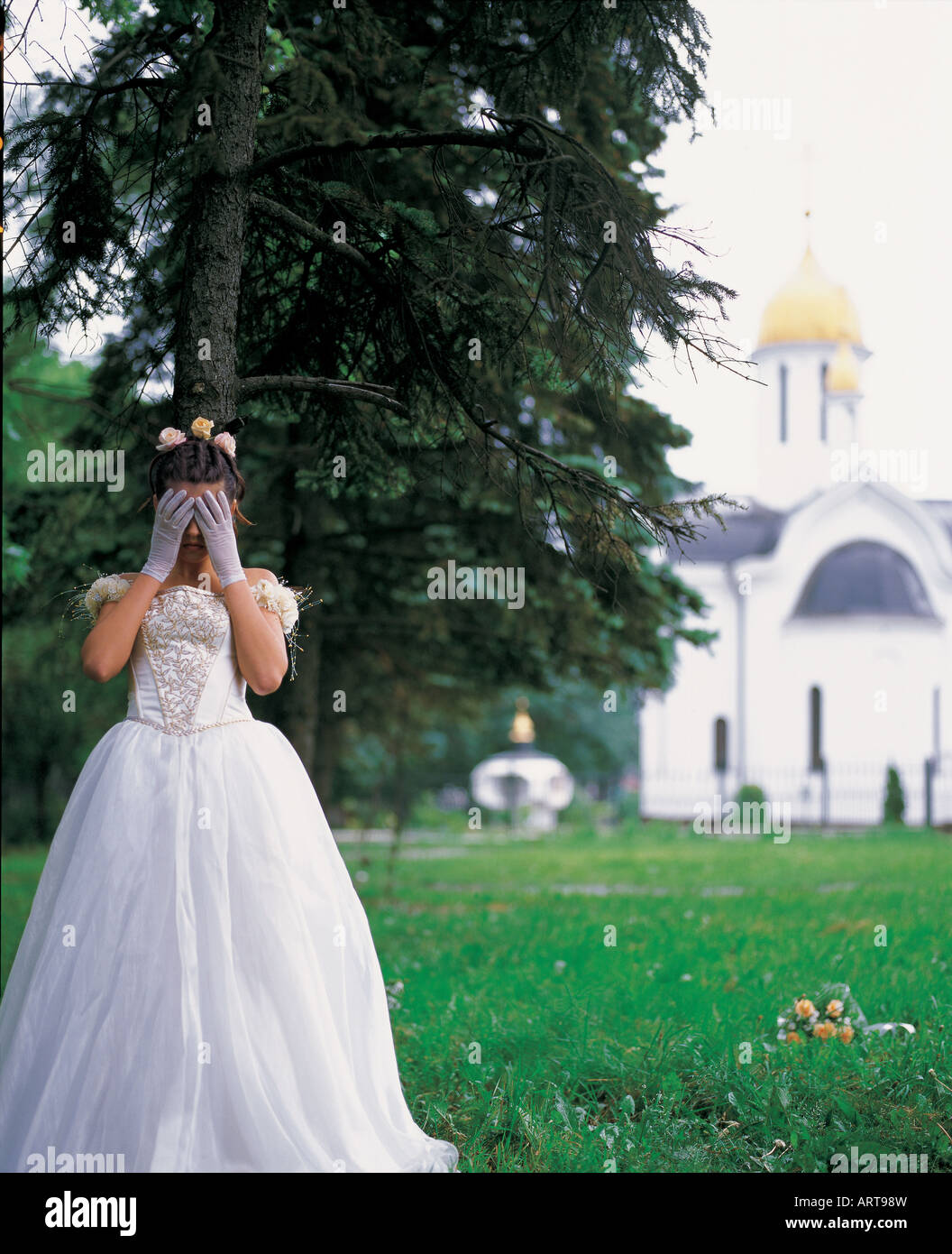 Sad bride at church Stock Photo - Alamy