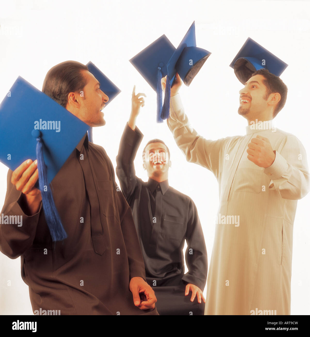 Graduates throwing caps hi-res stock photography and images - Alamy
