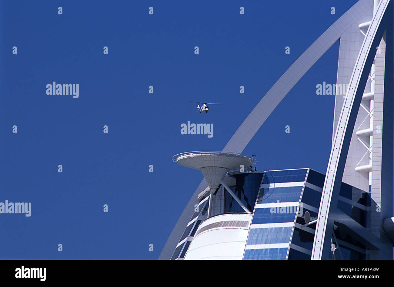 A helicopter landing on top of Burj Al Arab Hotel in Dubai, United Arab ...