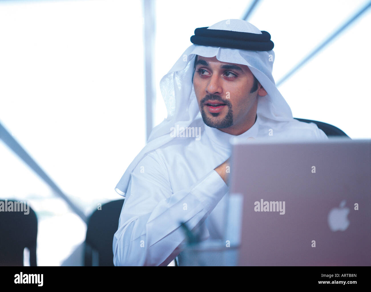 Arab businessman working on computer Stock Photo - Alamy