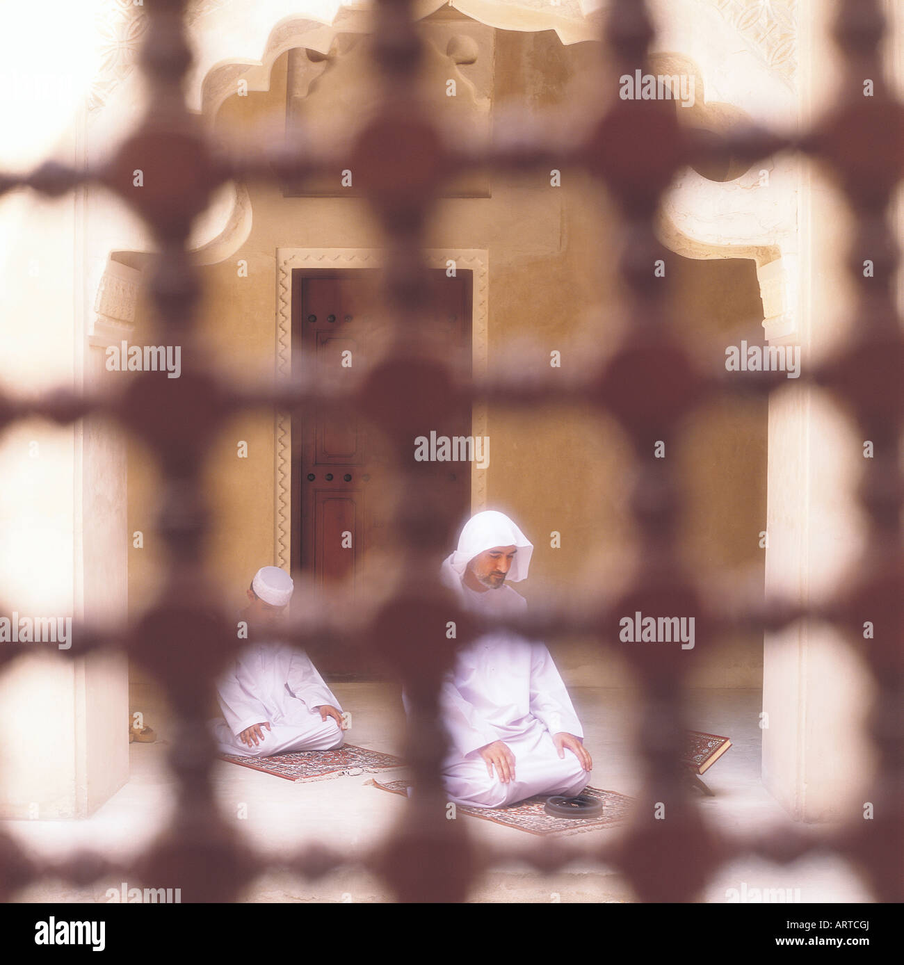 Father and son during prayer Stock Photo - Alamy