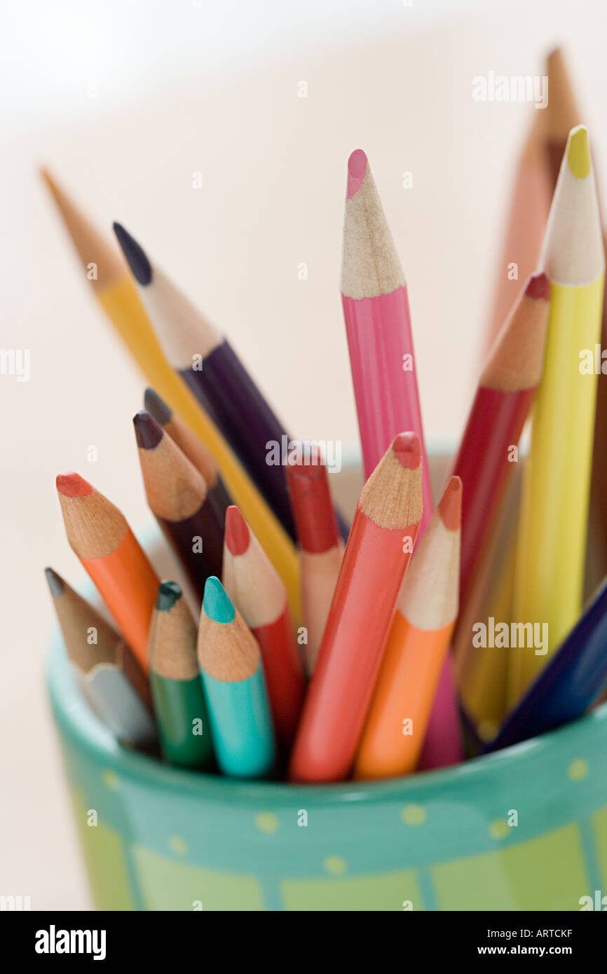 Coloured pencils in a pot Stock Photo - Alamy