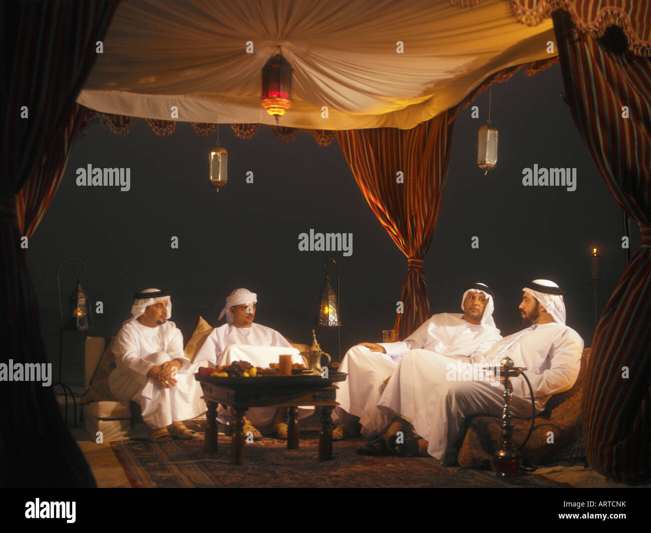 Ramadan: men sitting in Arabian tent for Iftar (fast-breaking meal ...