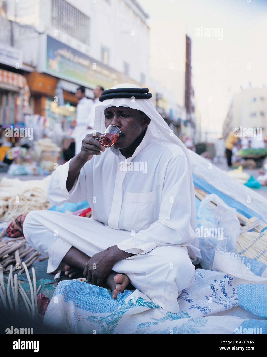 Merchant drinking tea in Bab Makkah, Jeddah, Saudi Arabia Stock Photo ...