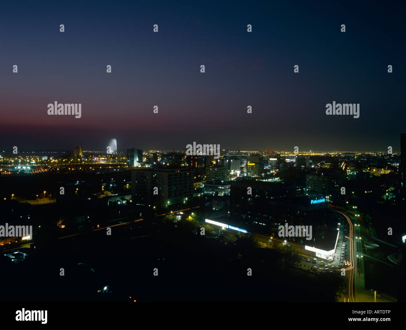 City of Jeddah at night with fountain in the Red Sea, Saudi Arabia ...