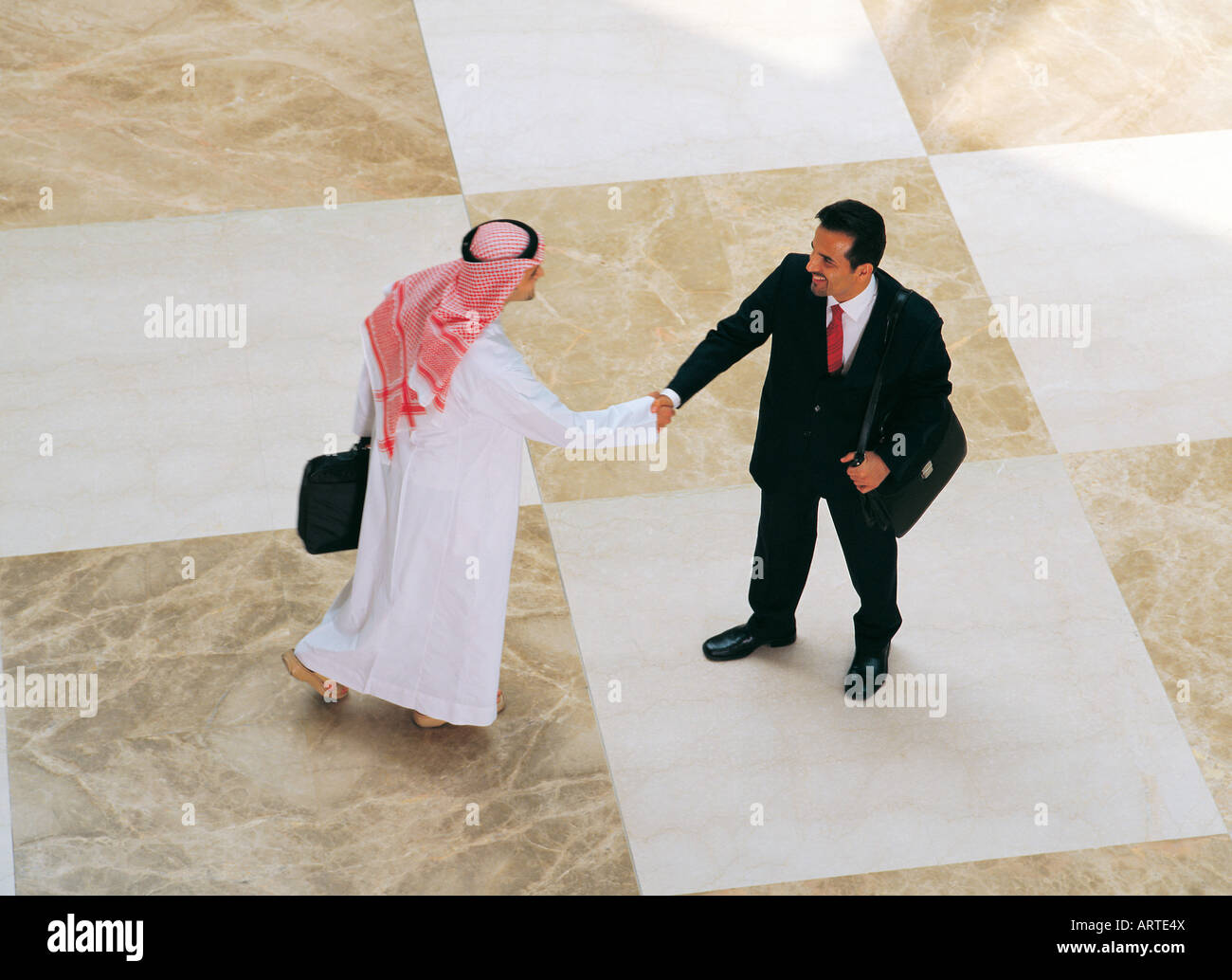 Arab men greeting other hi-res stock photography and images - Alamy