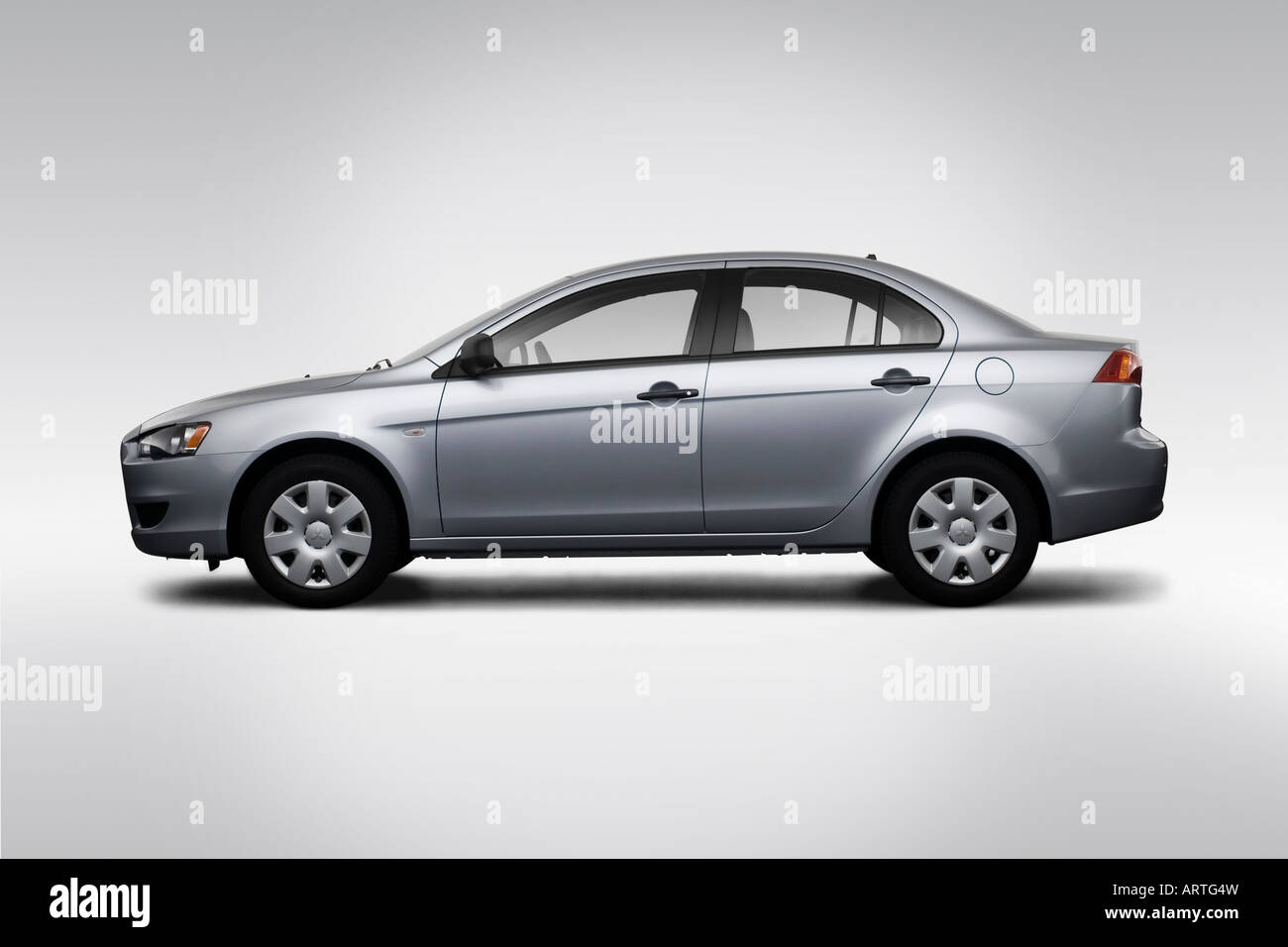2008 Mitsubishi Lancer DE in Silver - Drivers Side Profile Stock Photo ...