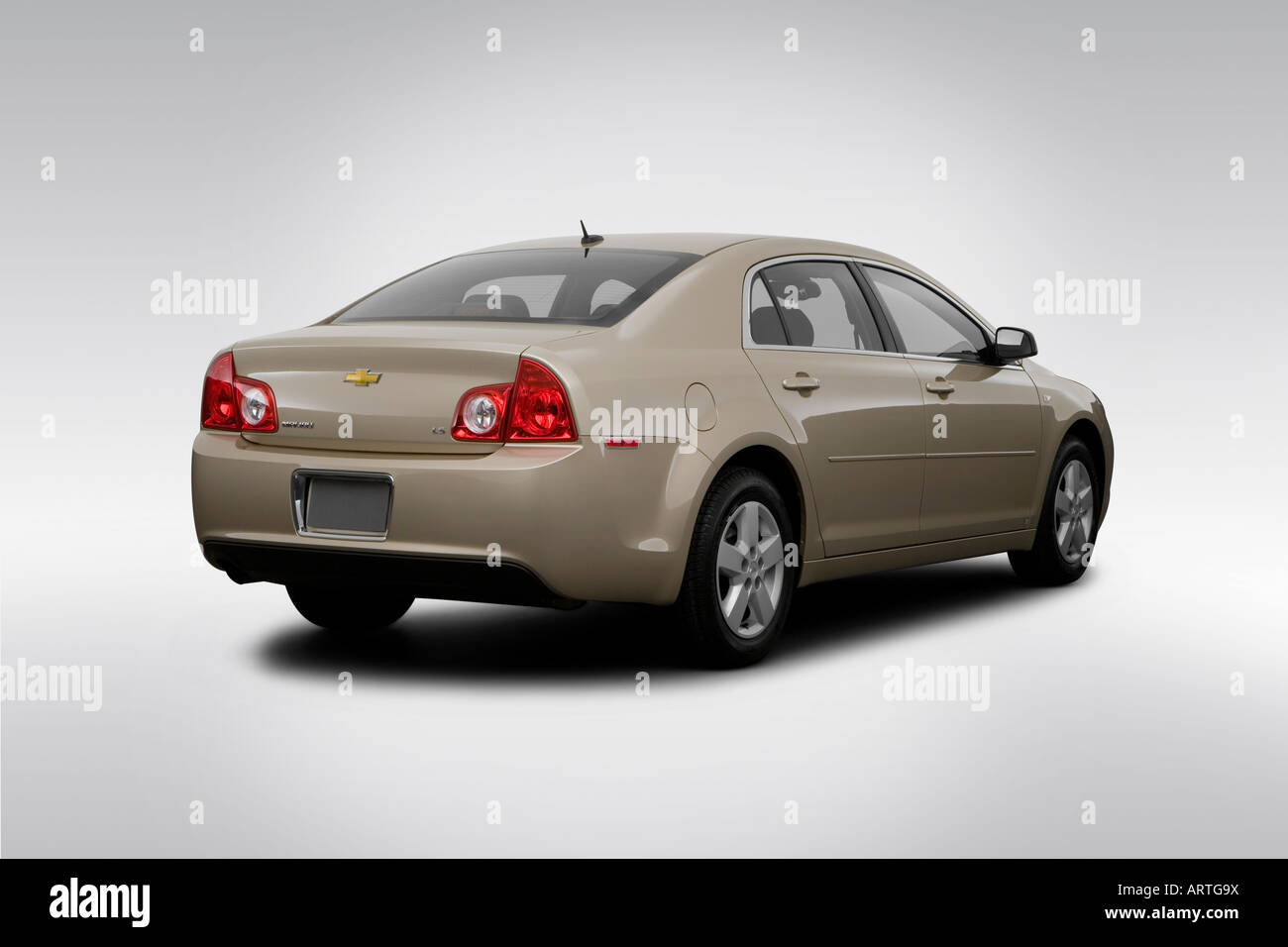 2008 Chevrolet Malibu LS in Beige - Rear angle view Stock Photo - Alamy
