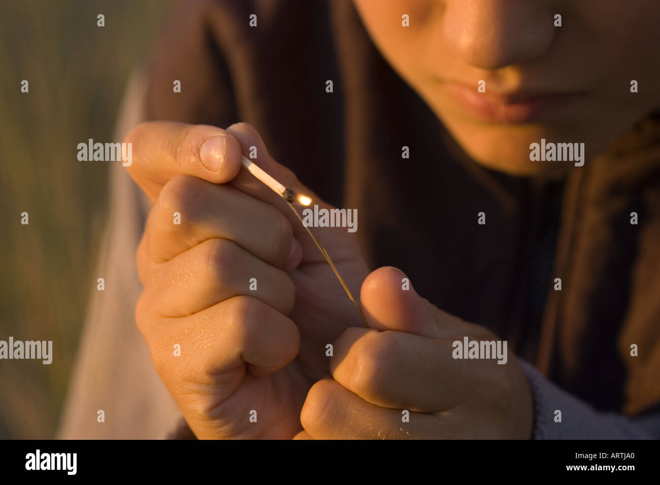 lighting a match Stock Photo - Alamy