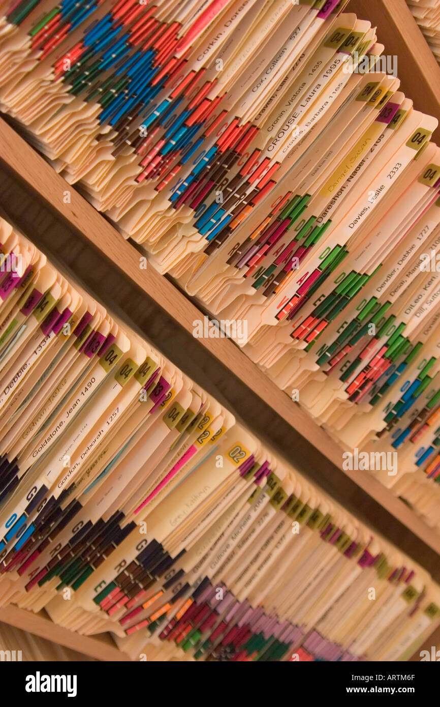 Rows of medical records in color colour Stock Photo - Alamy