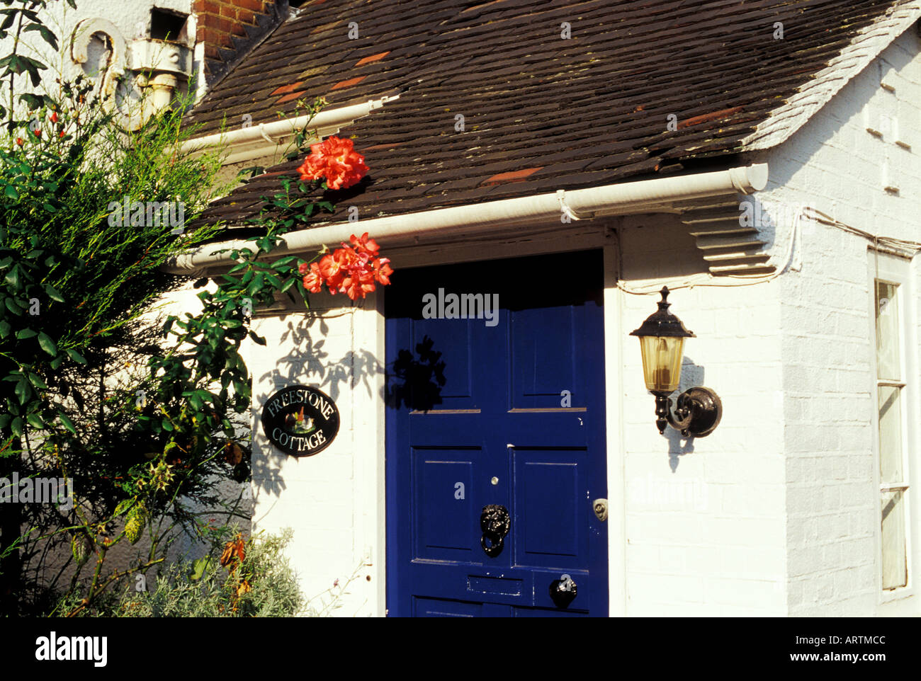 Blue cottage door North London Stock Photo - Alamy