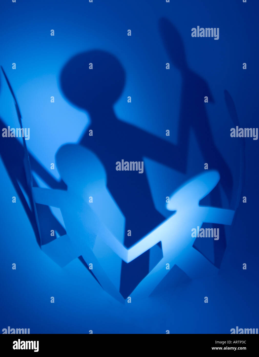 Paper chain men with mood lighting and modern toning effect Stock Photo ...