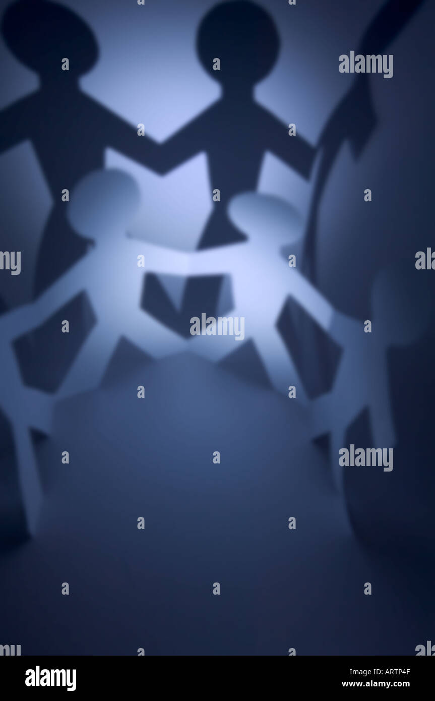 Paper chain men with mood lighting and modern toning effect Stock Photo ...