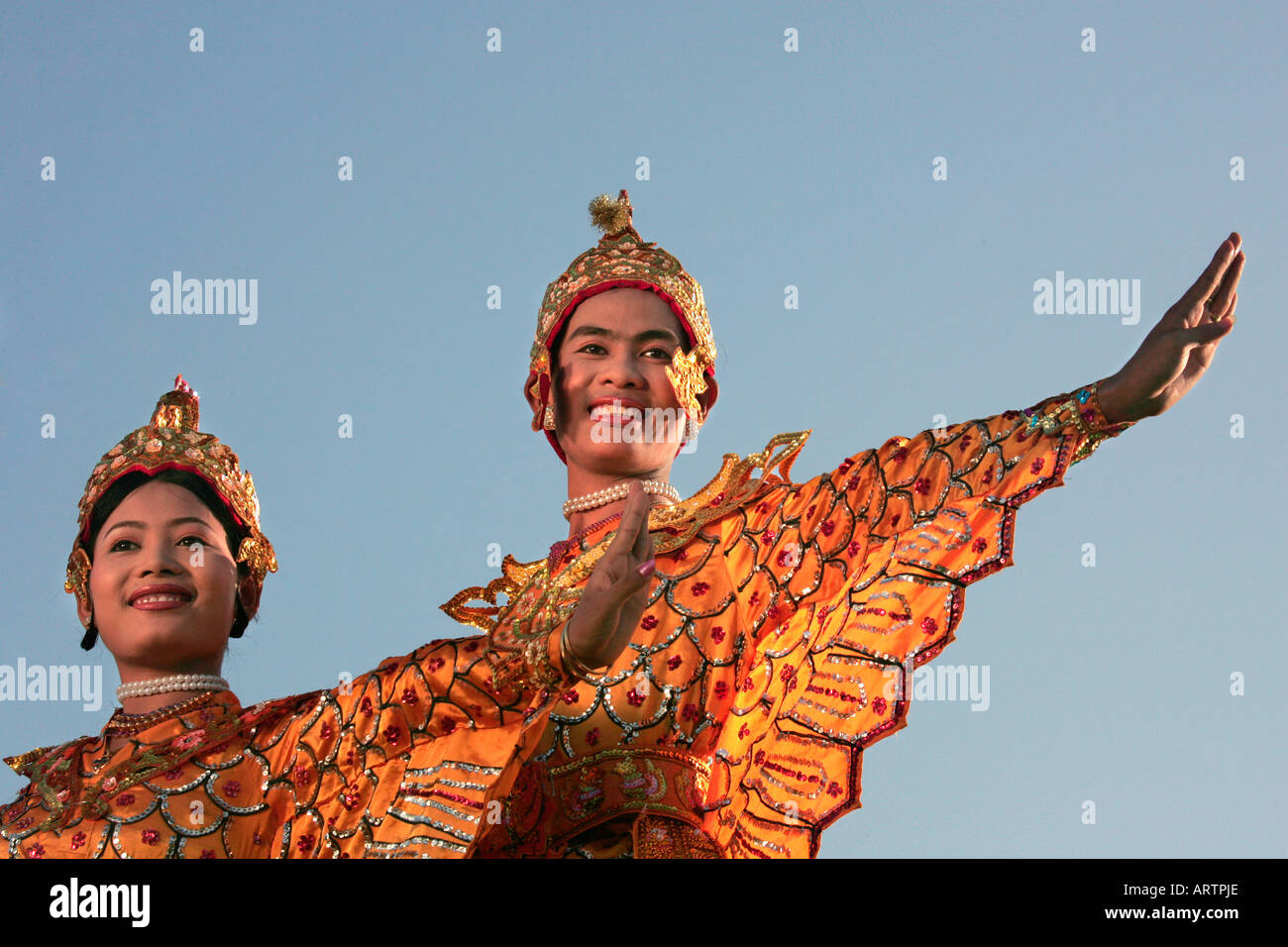 Traditional Mon dancers performing at a Pwe in Moulmein, Mon State ...