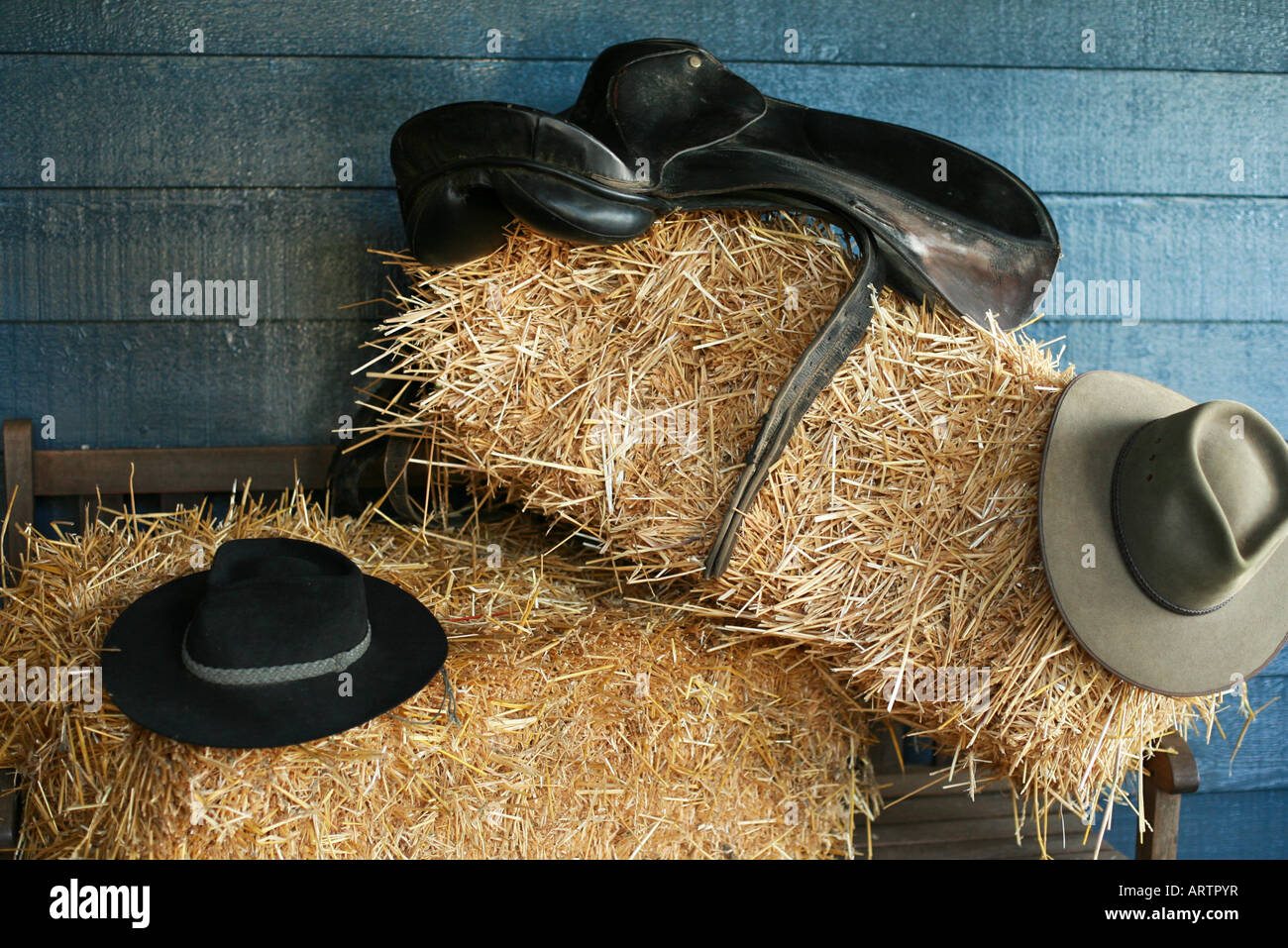 Hay, Hats and Saddles Stock Photo - Alamy