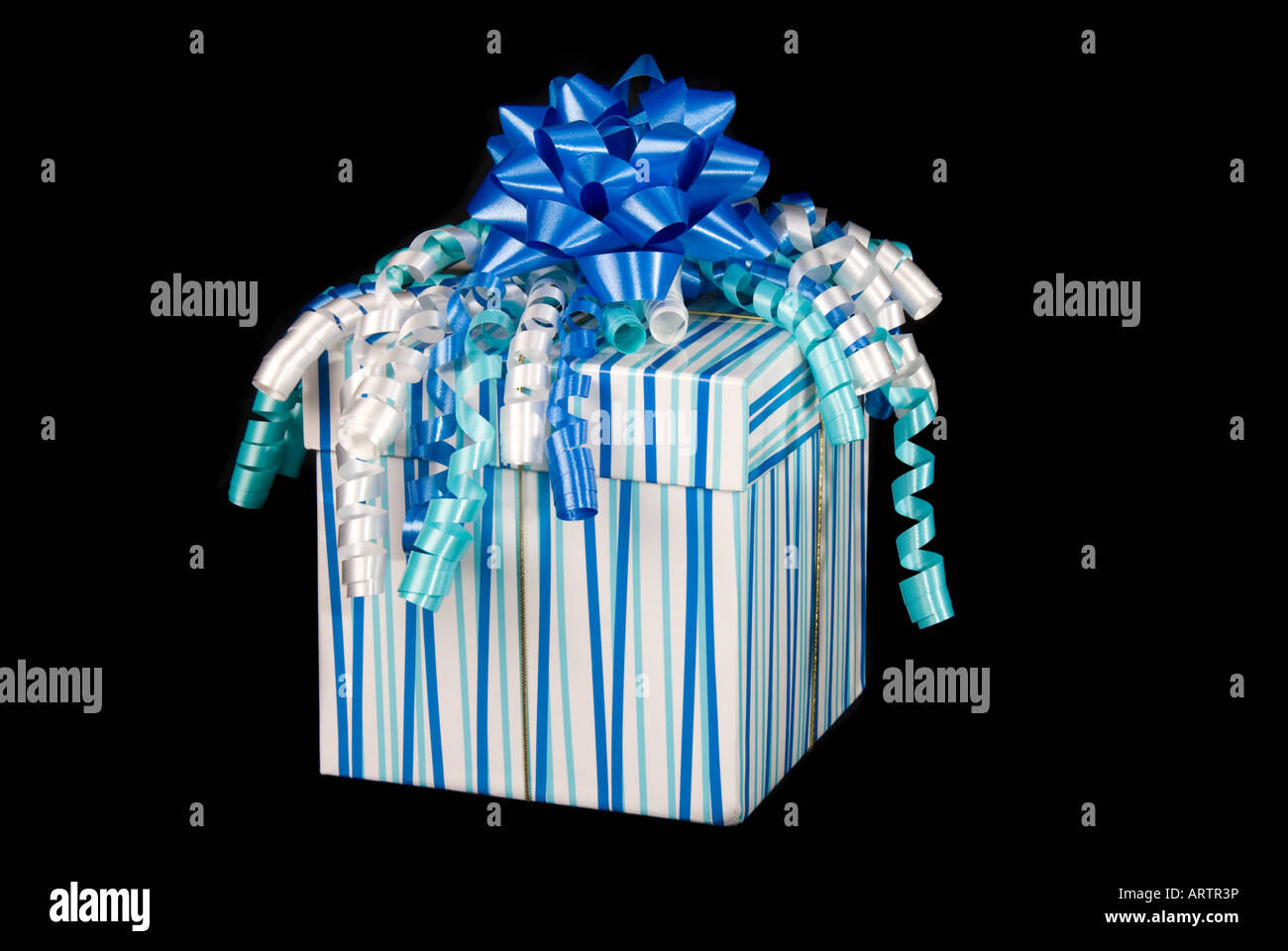 A beautiful blue gift box isolated against a black background Stock ...