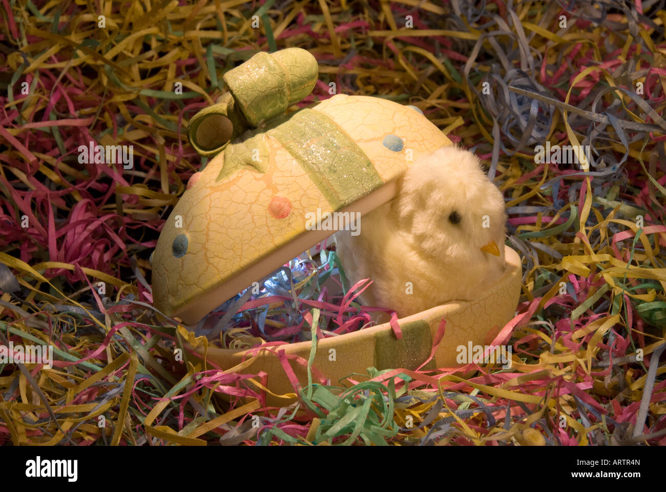 A ceramic easter egg opens up to display a lighted egg inside Stock ...