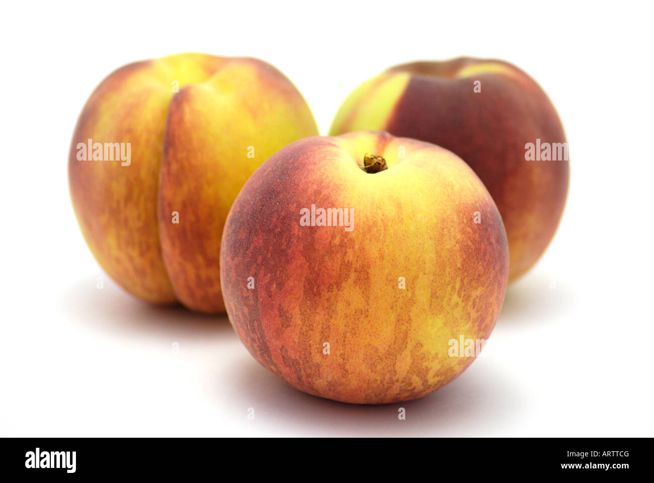 Three whole Peaches Stock Photo - Alamy