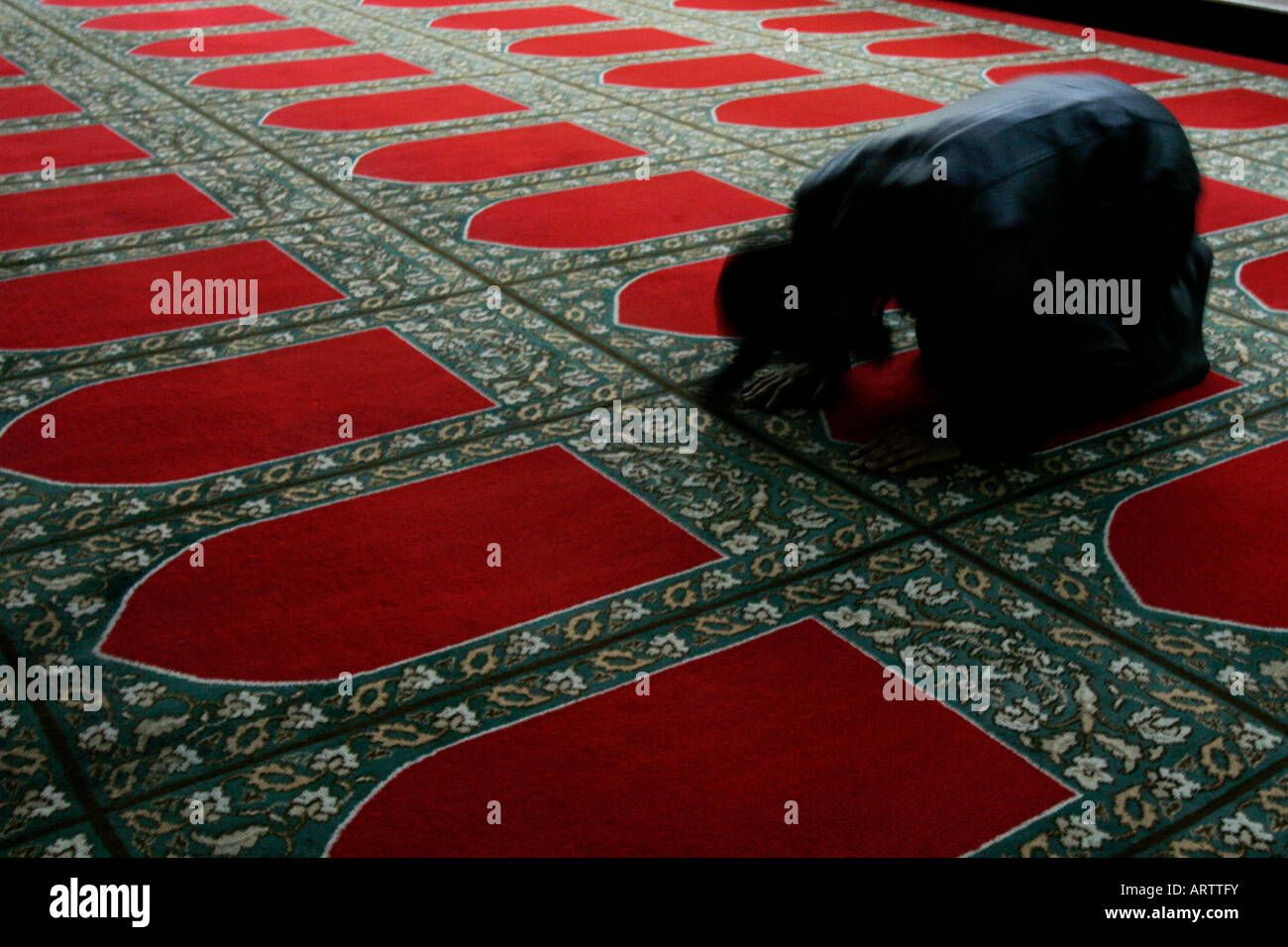 A Muslim Imam during prayer at a Mosque Stock Photo - Alamy