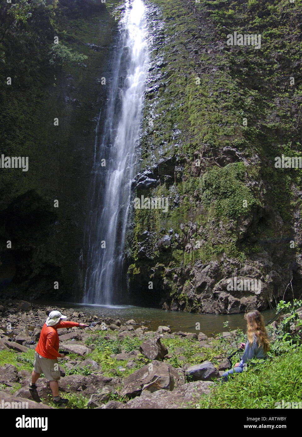 Hikers survey halawa falls left fork hi-res stock photography and ...