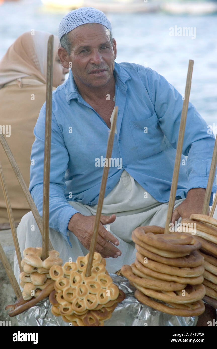 Man selling fresh bread in street hi-res stock photography and images ...