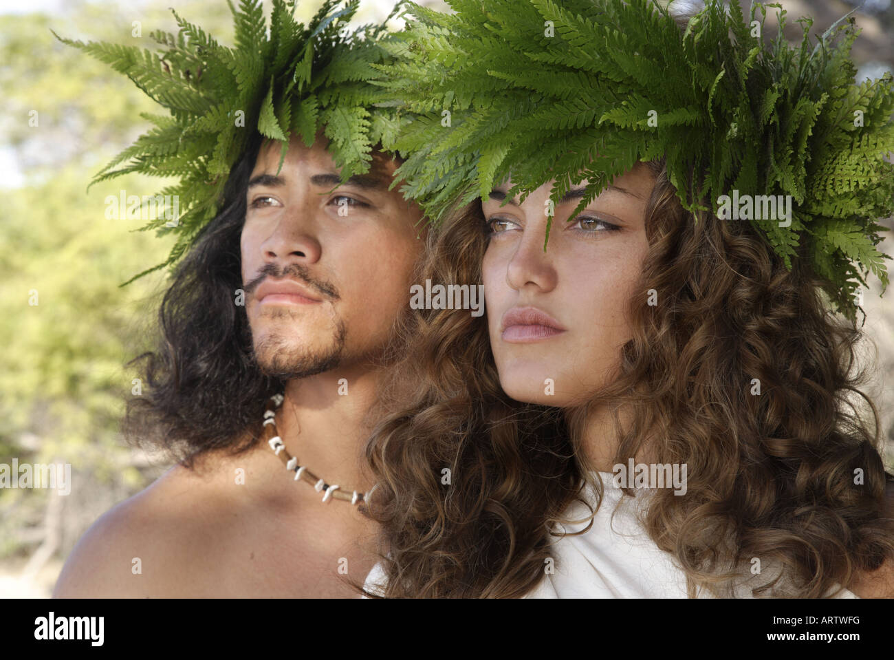 Male (kane) hula dancer deep in thought, wearing palapalai fern head ...
