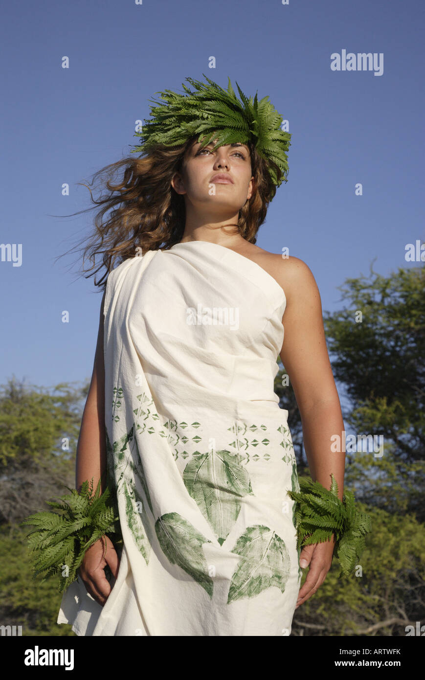 Male (kane) hula dancer deep in thought, wearing palapalai fern head ...