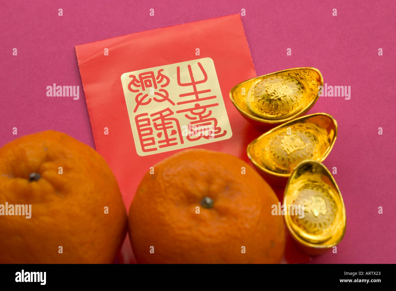 gold ingot, mandarin orange and red packet for chinese new year ...