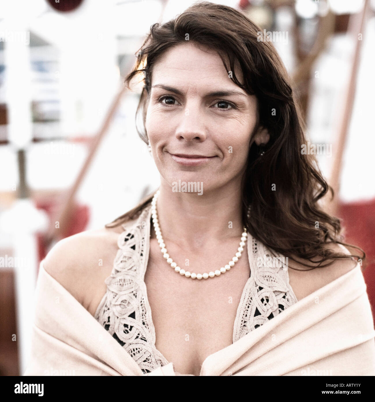 Mid adult woman smiling Stock Photo - Alamy