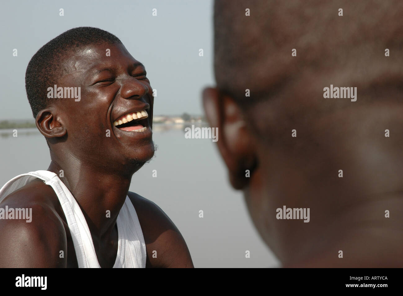 Laughing African male The Gambia West Africa Stock Photo - Alamy