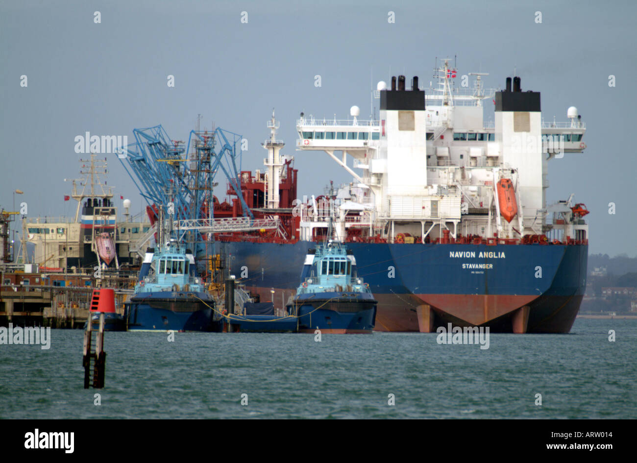 Oil tanker Navion Anglia with berthing tugs at FawleyTerminal on ...
